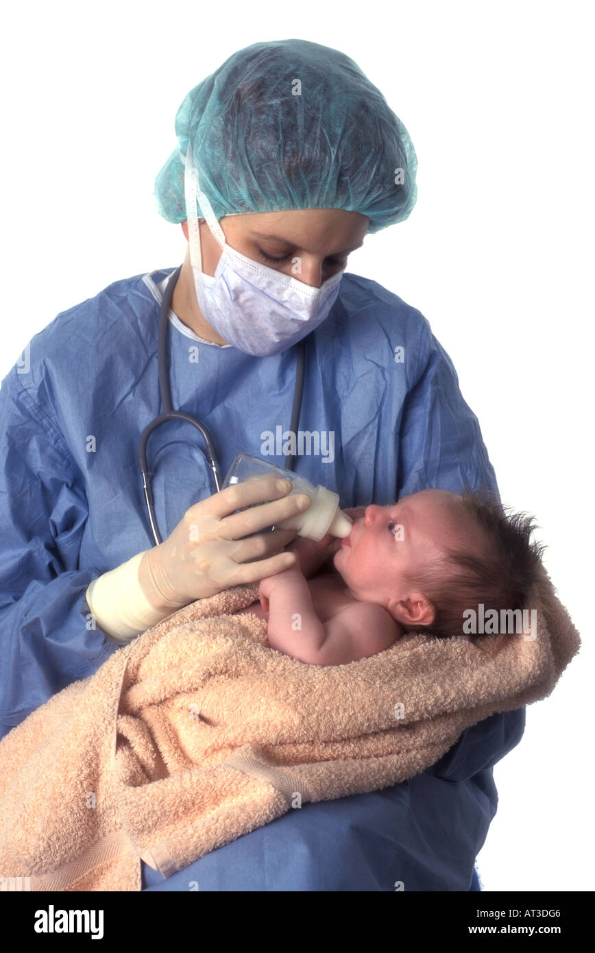 Pediatric nurse feeding a newborn baby with a bottle Stock Photo - Alamy