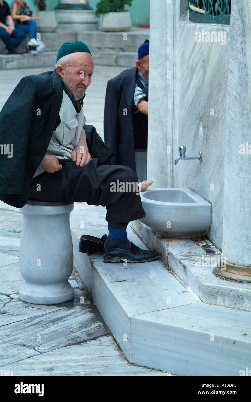 Old man feet new mosque hi-res stock photography and images - Alamy