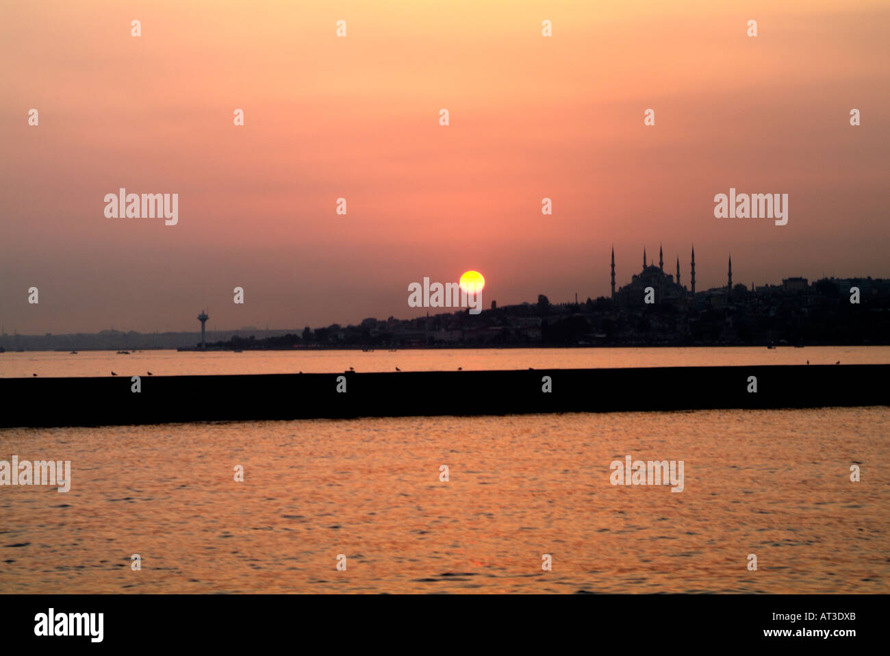 Sunset at Bosphorus with silhouetted Blue Mosque, Istanbul, Turkey ...
