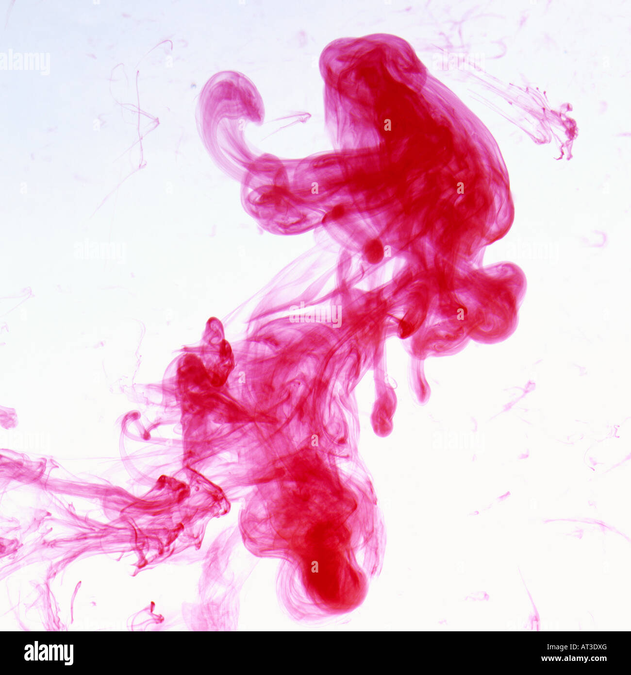 Red liquid in water Stock Photo - Alamy