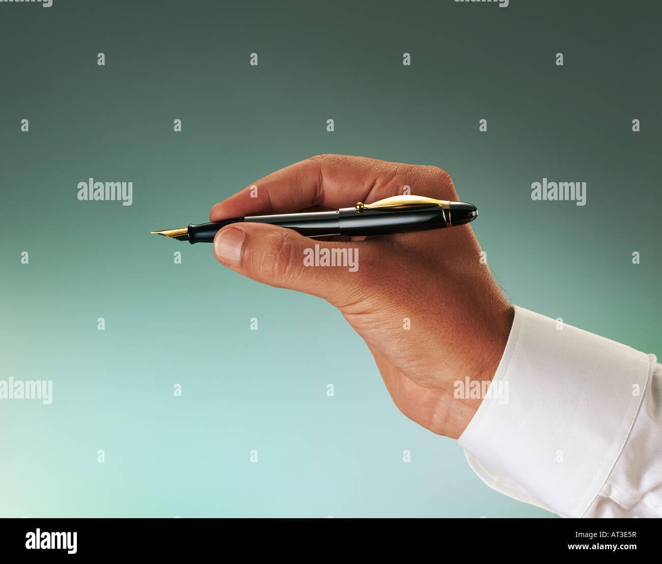 Hand and pen Cut Out Stock Images & Pictures - Alamy