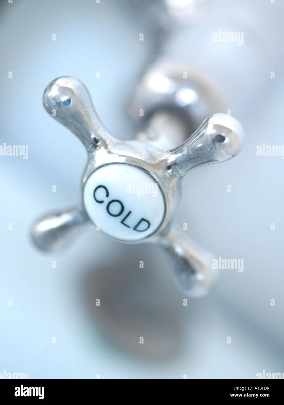 The top of a tap marked "cold Stock Photo - Alamy