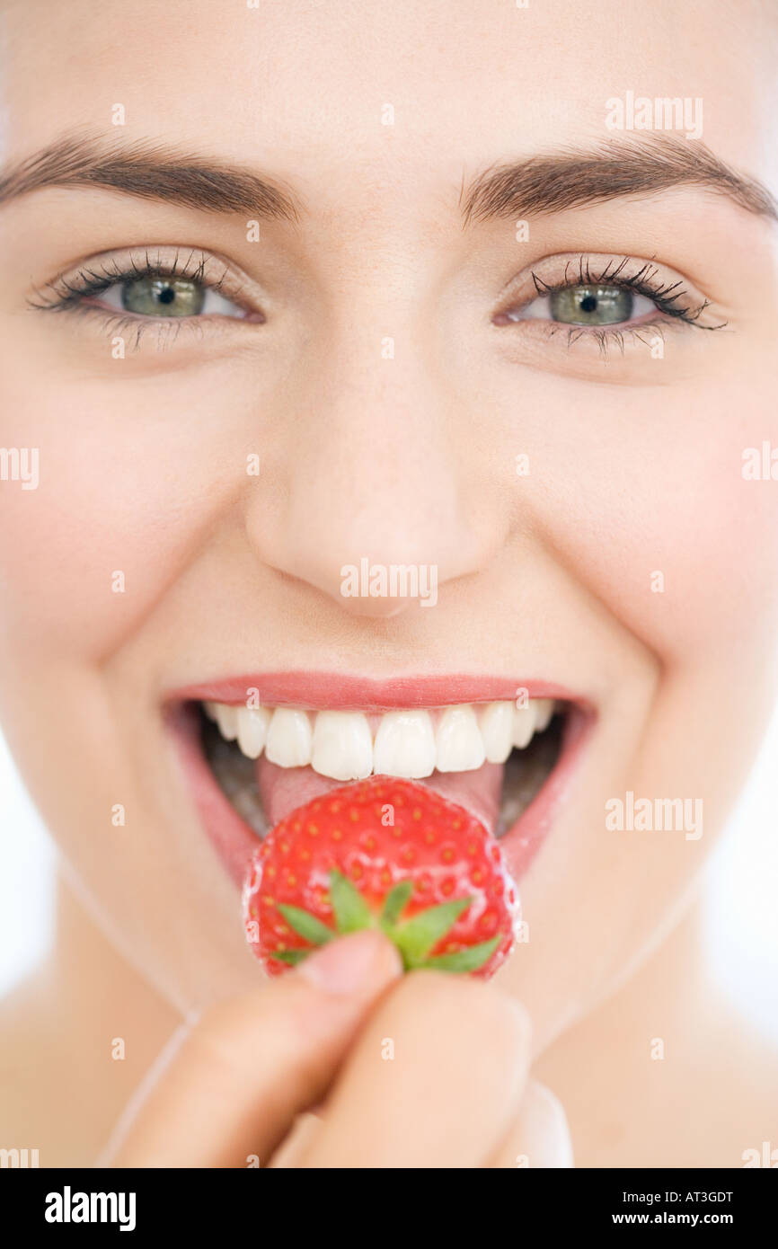 Woman strawberry teeth hi-res stock photography and images - Alamy