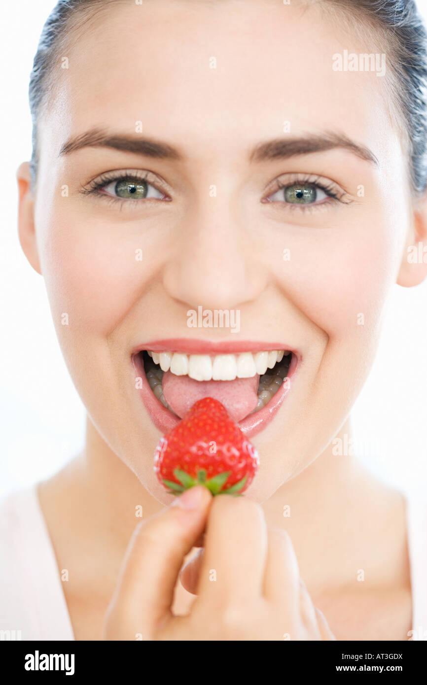 Woman strawberry teeth hi-res stock photography and images - Alamy