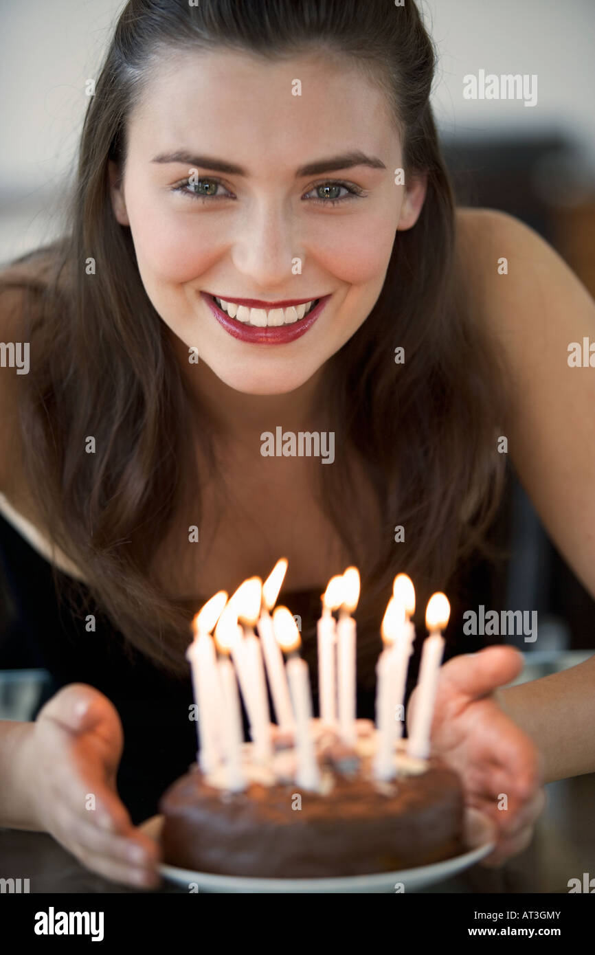 Woman and birthday cake hi-res stock photography and images - Alamy