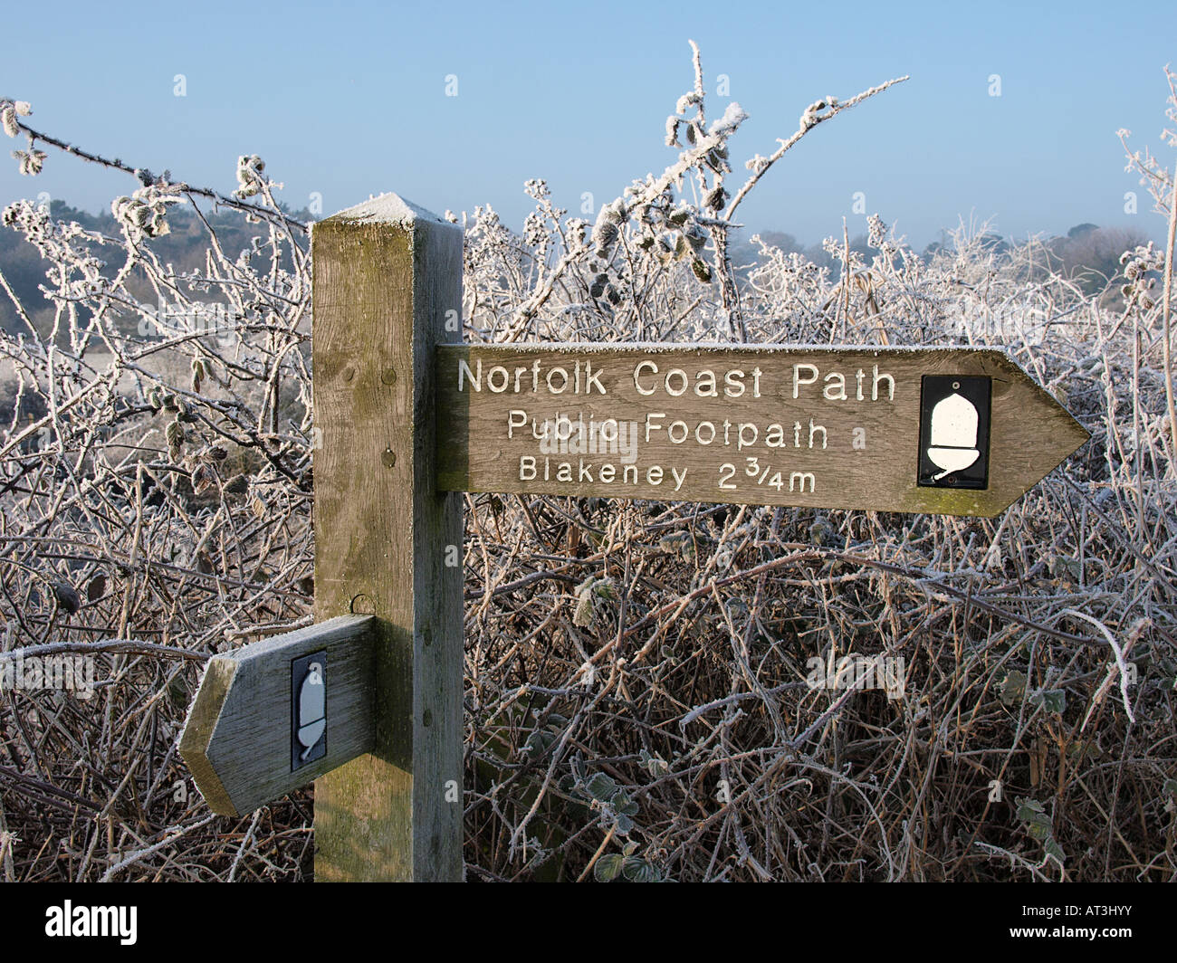 FROST COVERED WOODEN FINGER POST SIGN OF THE NORFOLK COAST PATH PUBLIC ...