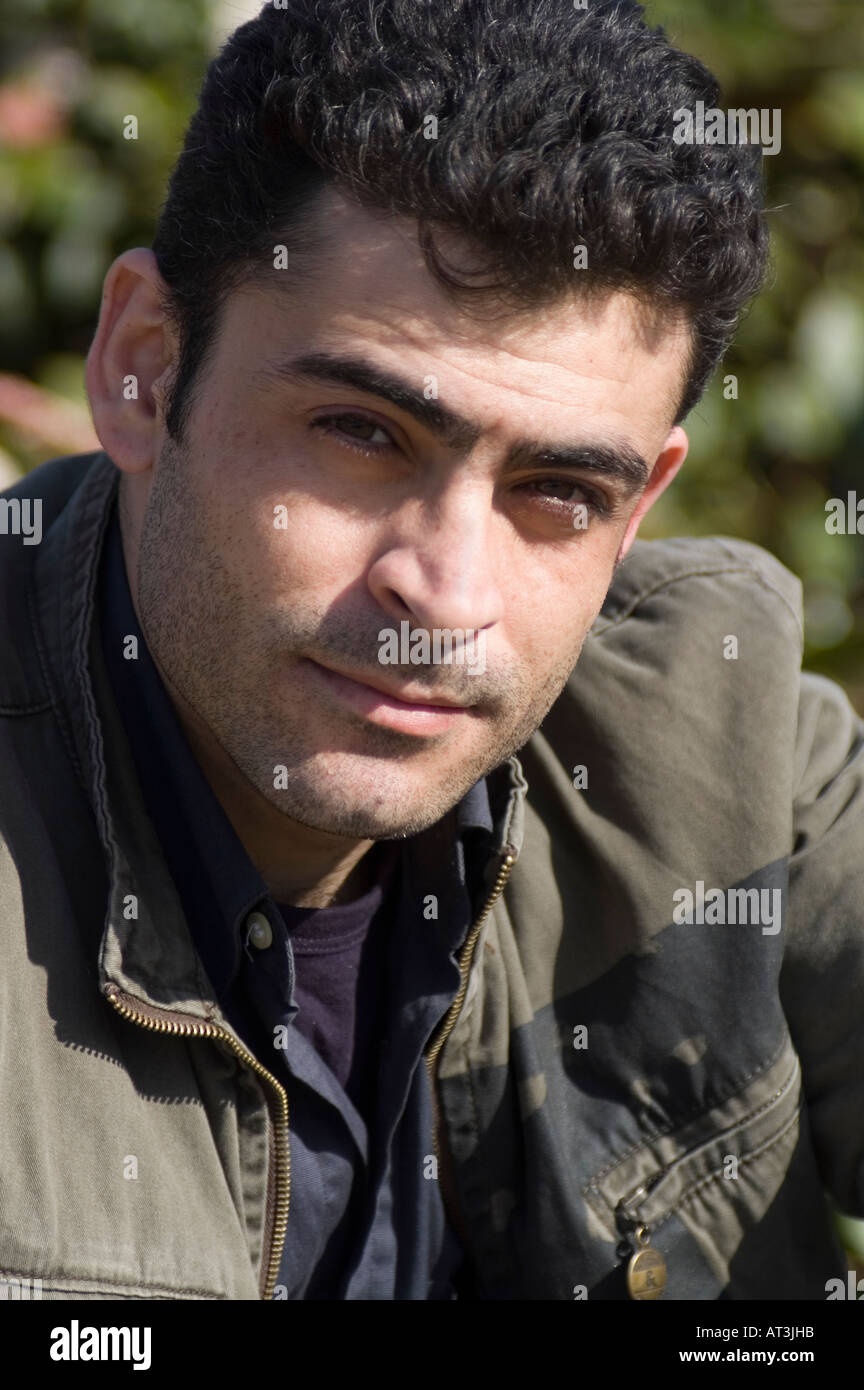 Portrait of a serious ethnic man Stock Photo - Alamy