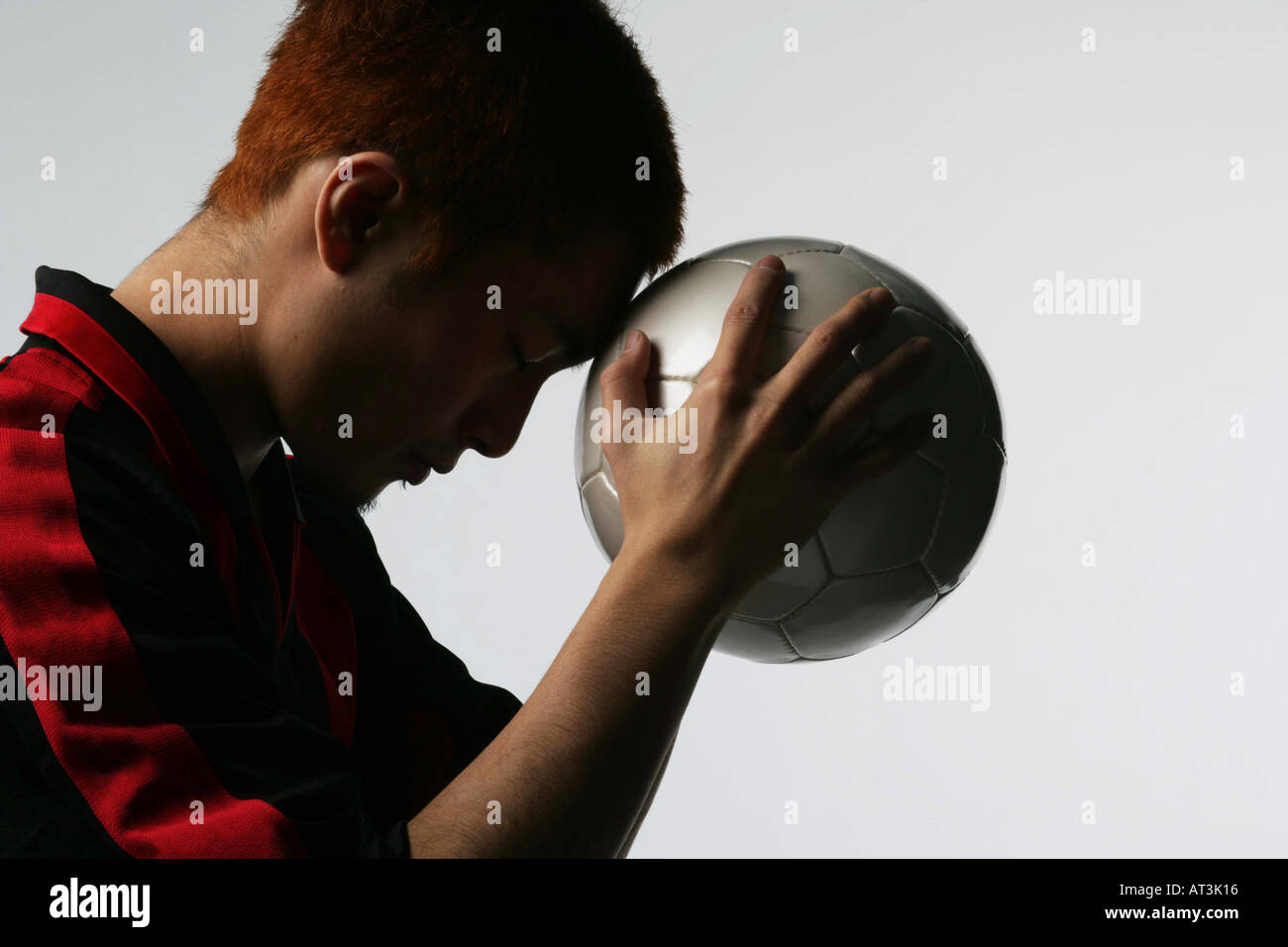 Football player praying hi-res stock photography and images - Alamy