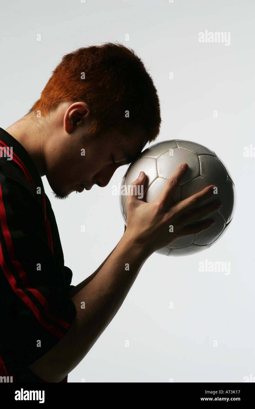 Soccer player praying hi-res stock photography and images - Alamy