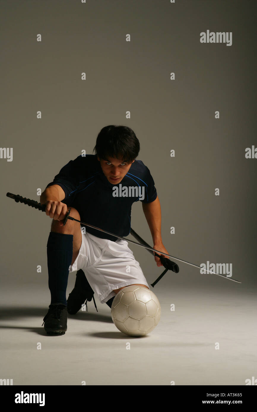 Kneeling sword hi-res stock photography and images - Alamy