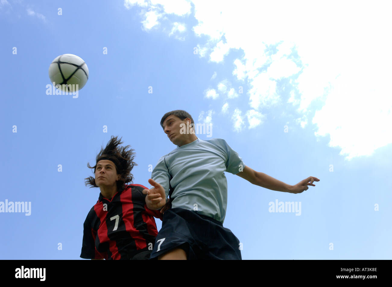 Action jumping of ground football hi-res stock photography and images ...