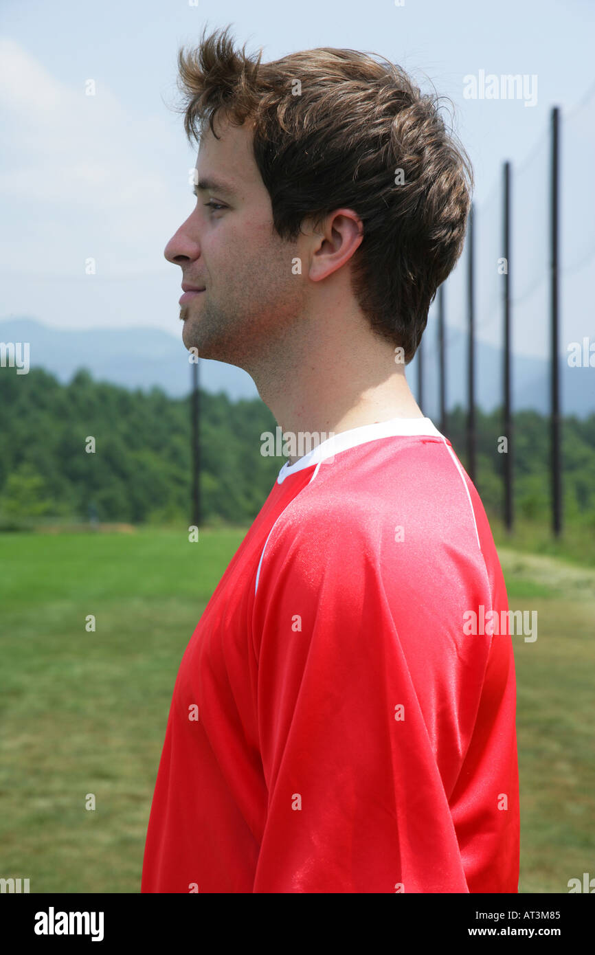 Side view of soccer player Stock Photo - Alamy
