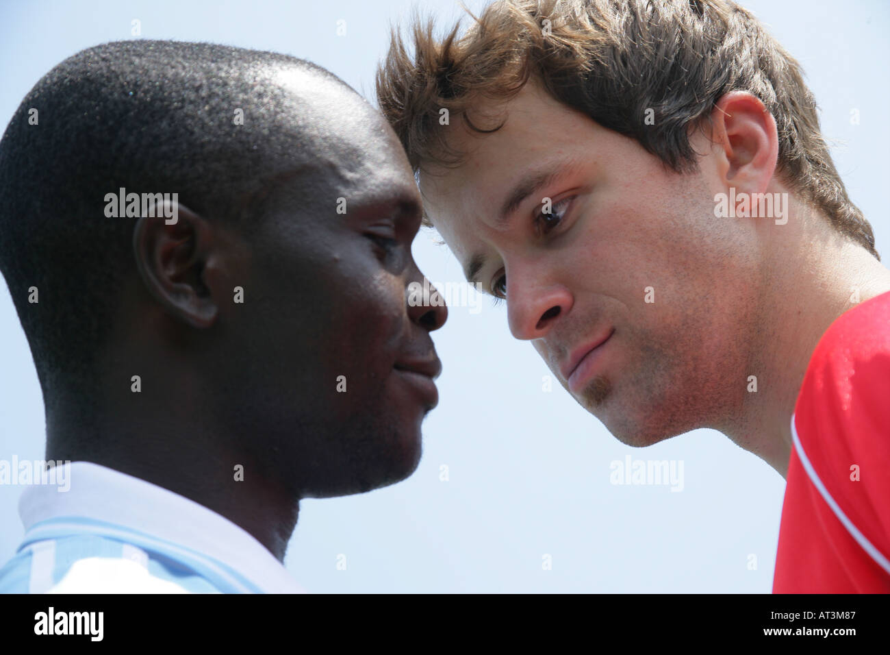 Two players from rival teams face off Stock Photo - Alamy