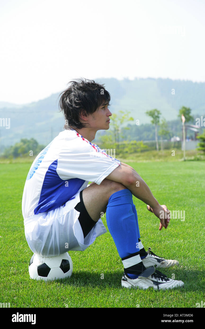 Seated sitting football soccer hi-res stock photography and images - Alamy
