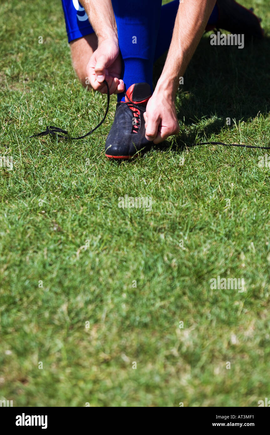 Football feet shoes boots socks hi-res stock photography and images - Alamy