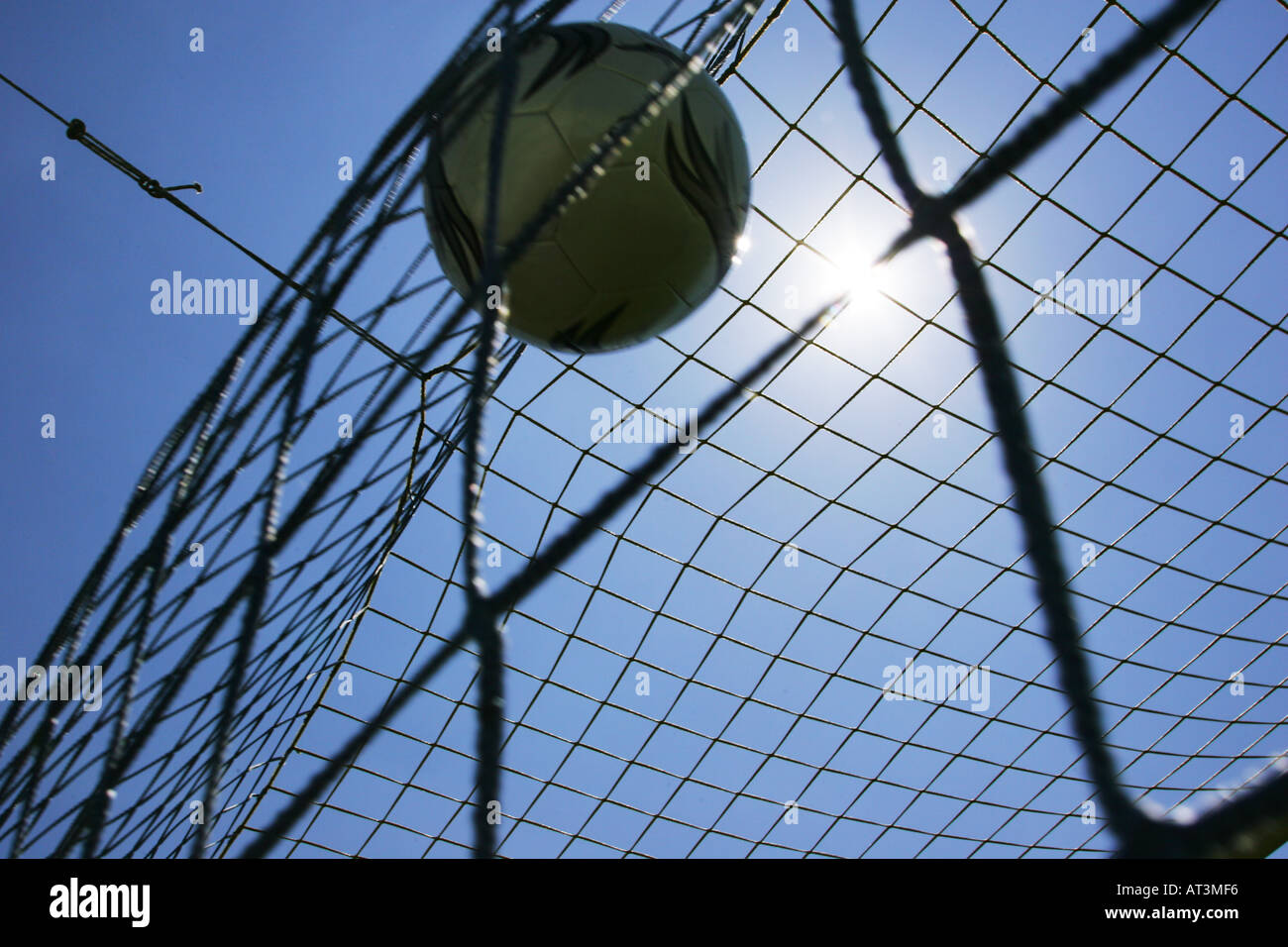 Football hitting back goal hi-res stock photography and images - Alamy
