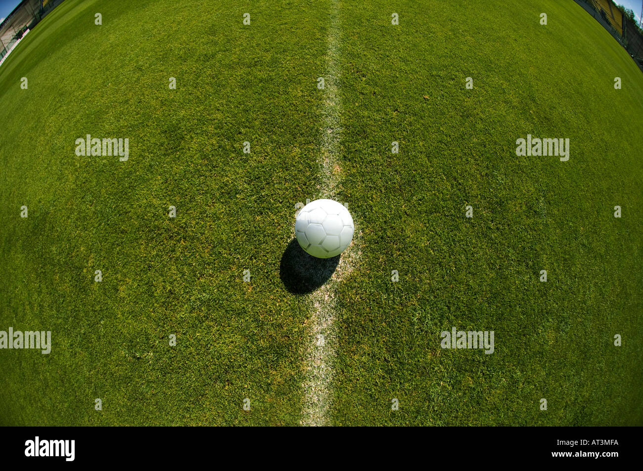 Ball on centre of football pitch hi-res stock photography and images ...