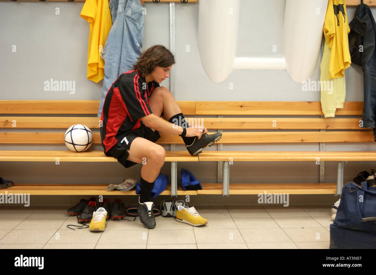 Football boots in the dressing room hi-res stock photography and images ...