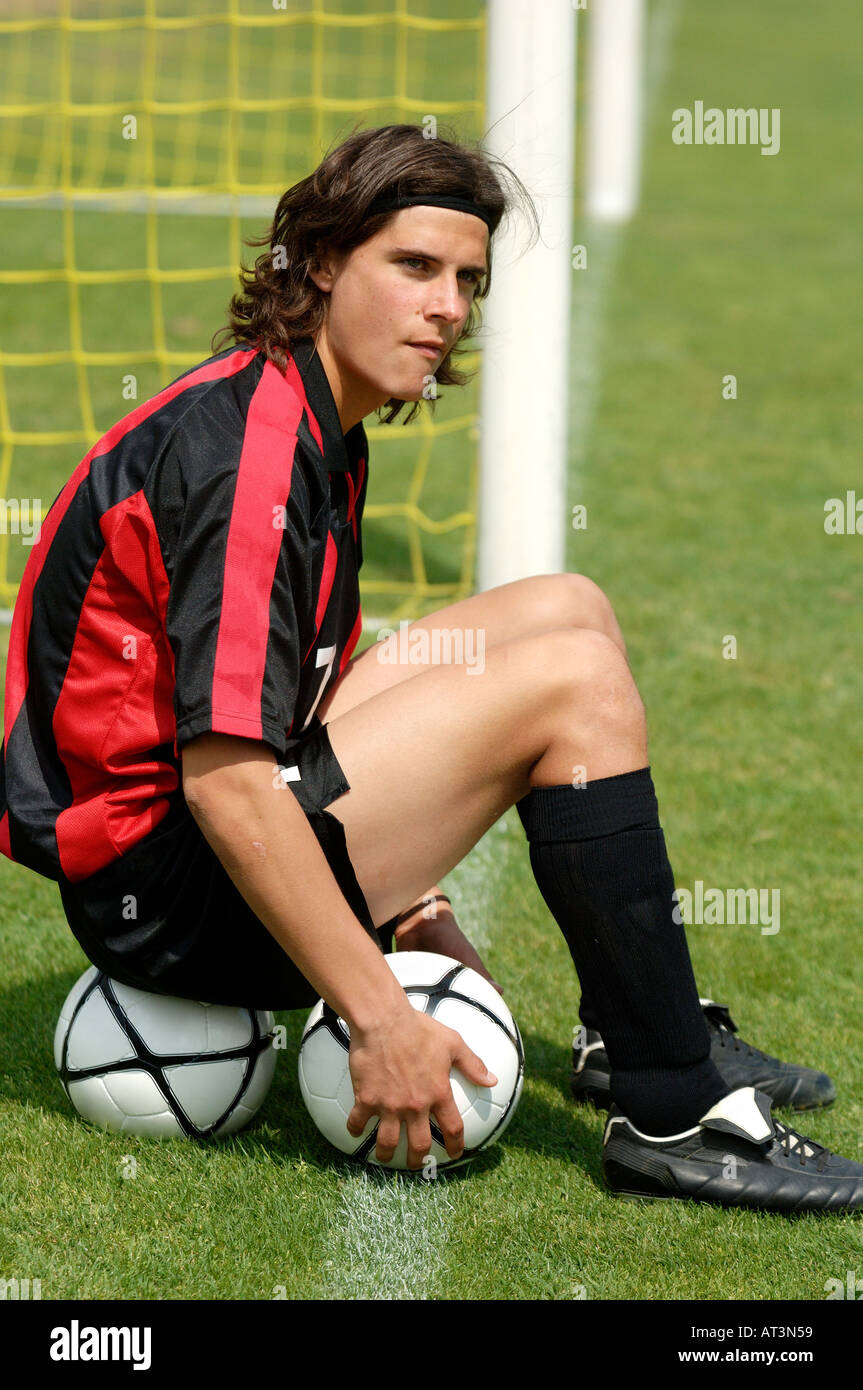 Soccer player sitting alone hi-res stock photography and images - Alamy