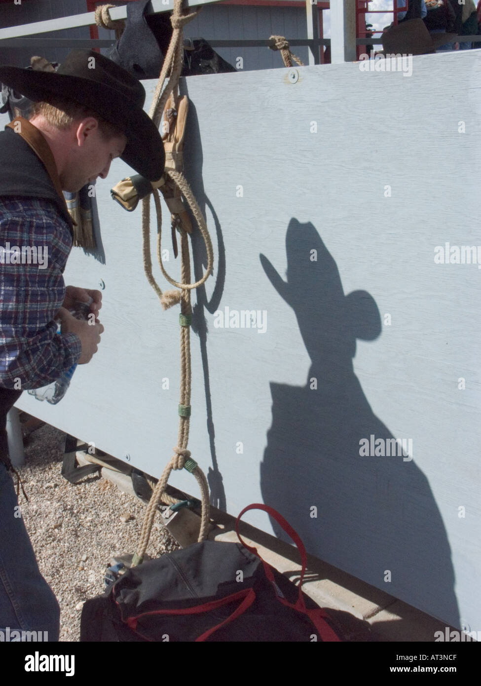 Shadows of Cowboy in full dress and gear before the Tucson Rodeo ...