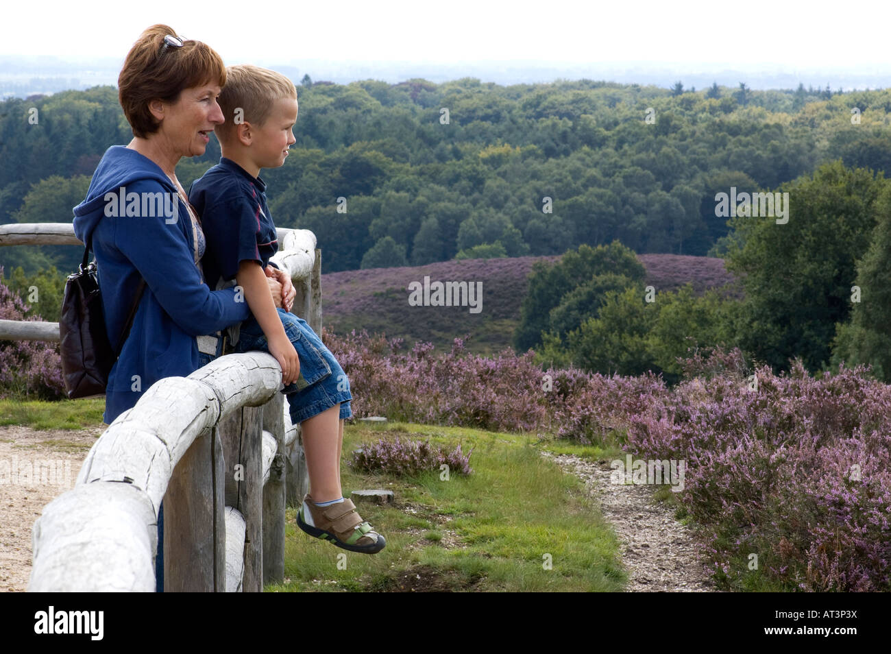 Grandma and grandson looking at a beautiful landscape Stock Photo - Alamy