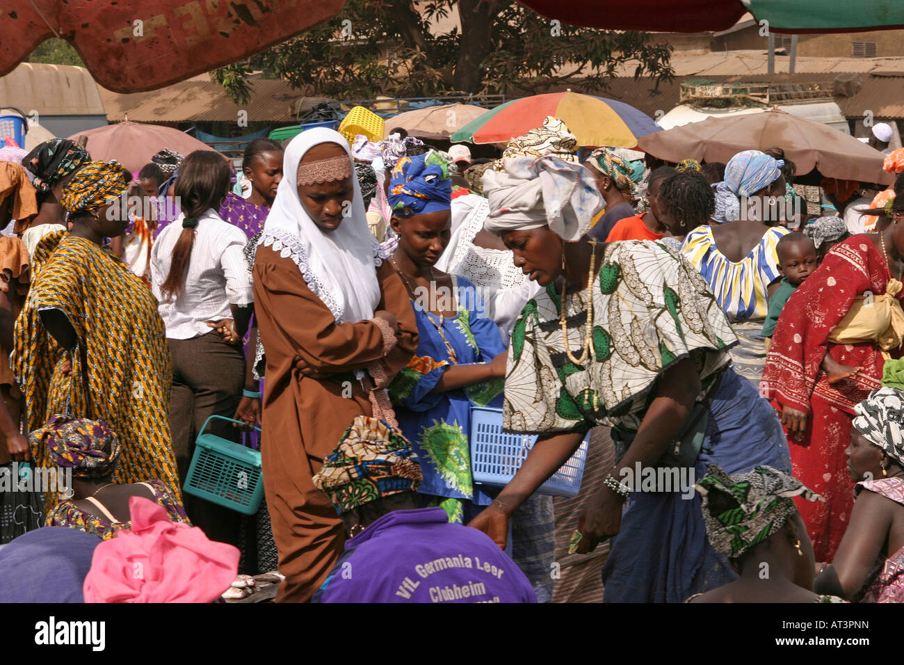 The Gambia Serekunda market Muslim women shopping Stock Photo - Alamy