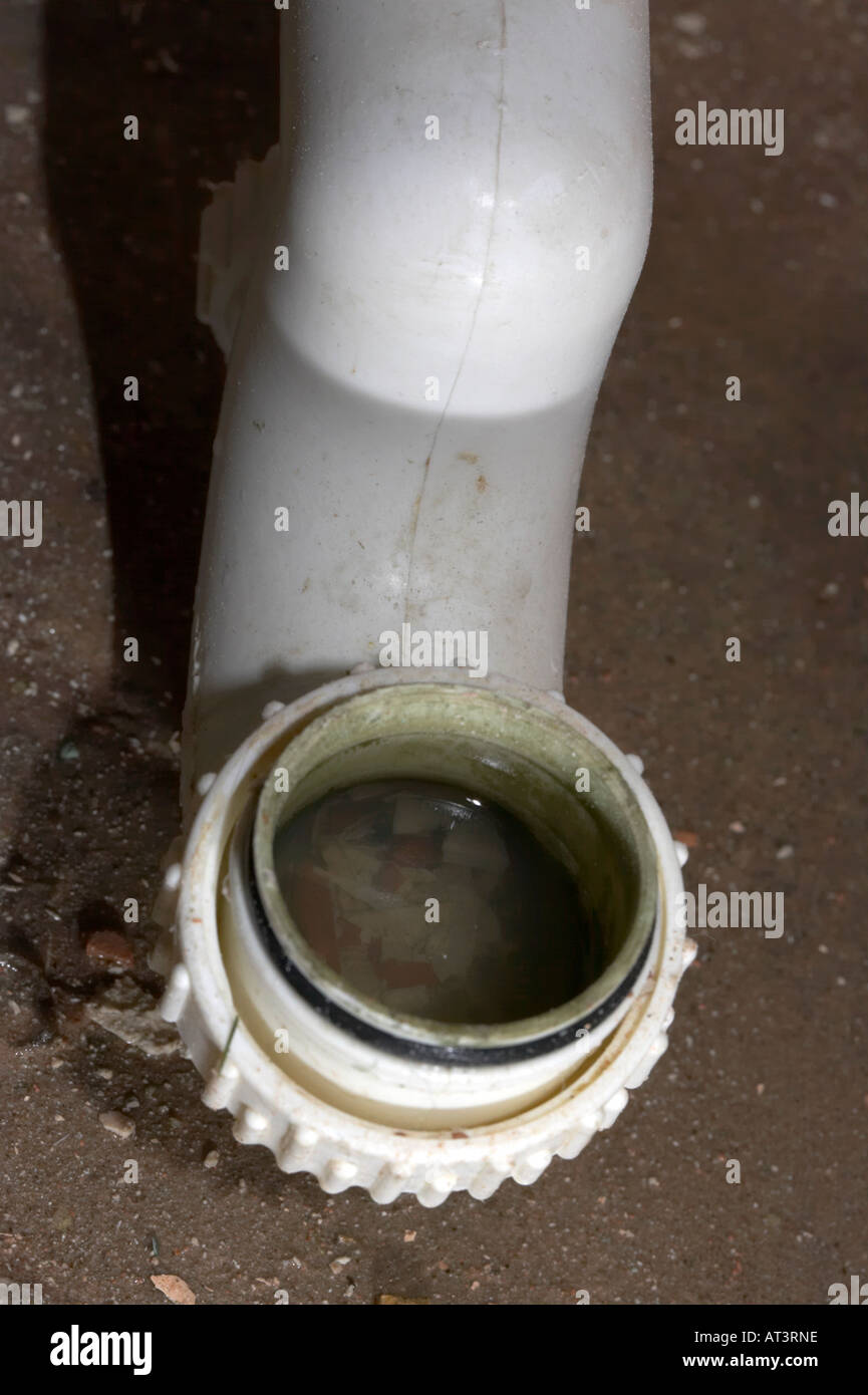 old dirty unsanitary plastic sink waste pipe with connector Stock Photo ...