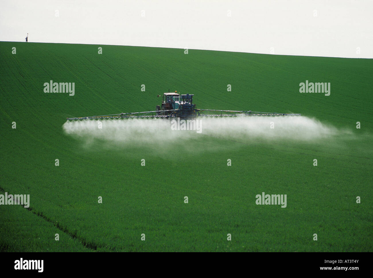 Spraying fertilizer on crops in France Stock Photo - Alamy