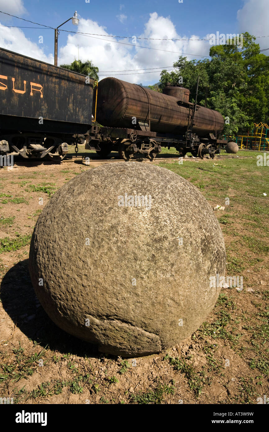 Costa Rica Palmar Sur ancient Pre Columbian sphere in front of old ...