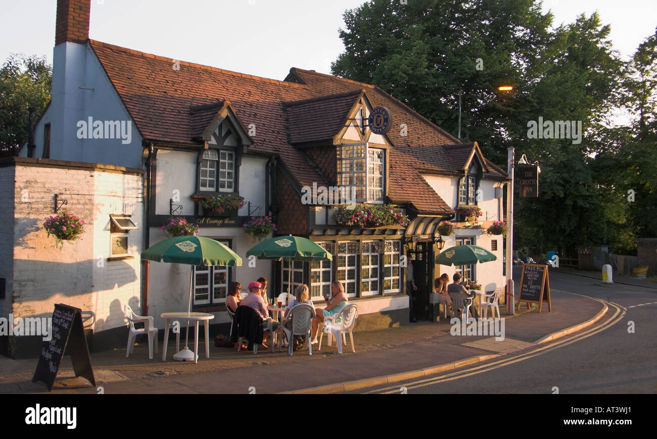 People drinking outside the Grotto pub Weybridge Surrey England Stock ...