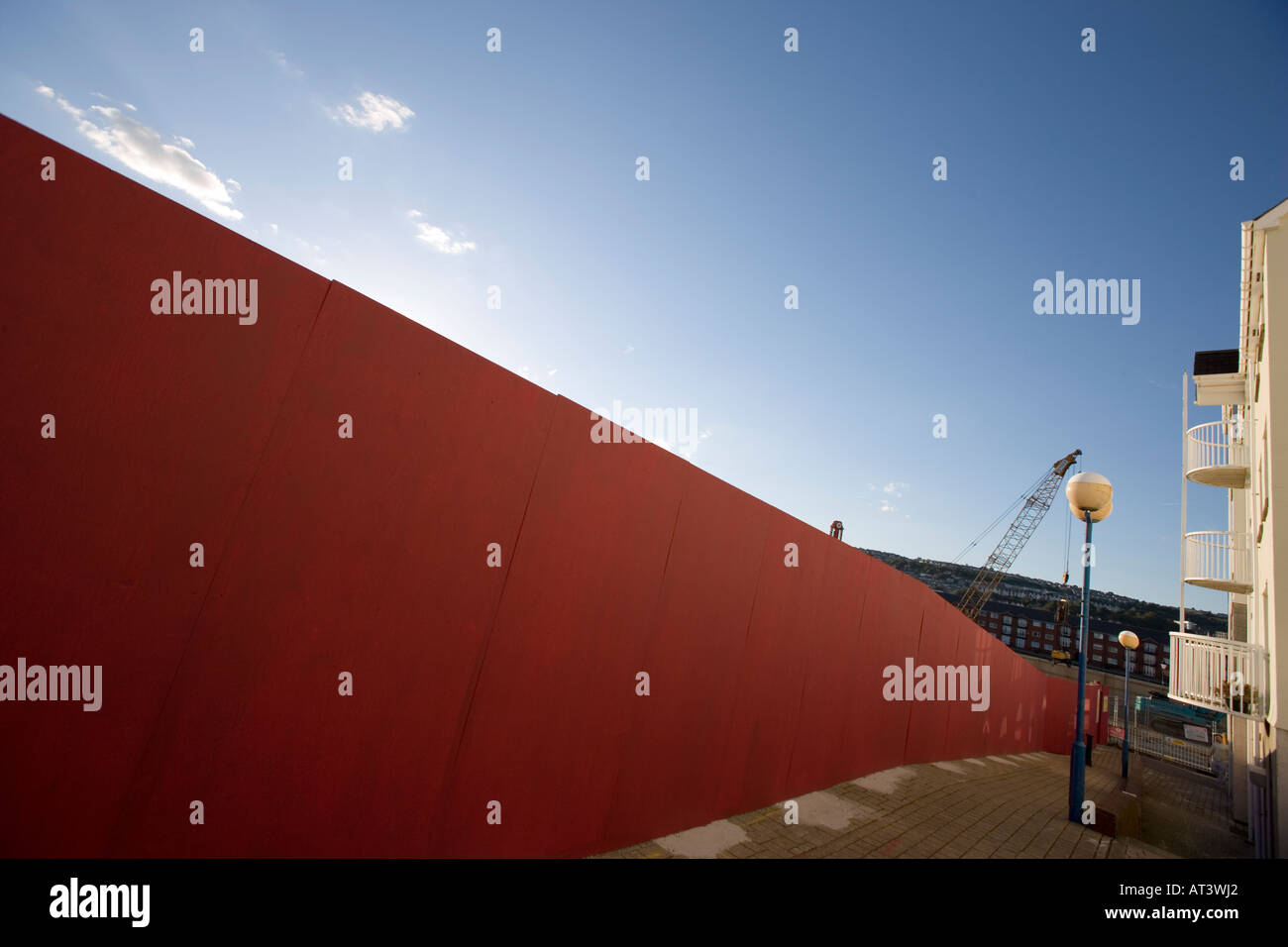 Building hoarding on housing estate Swansea Wales Stock Photo - Alamy