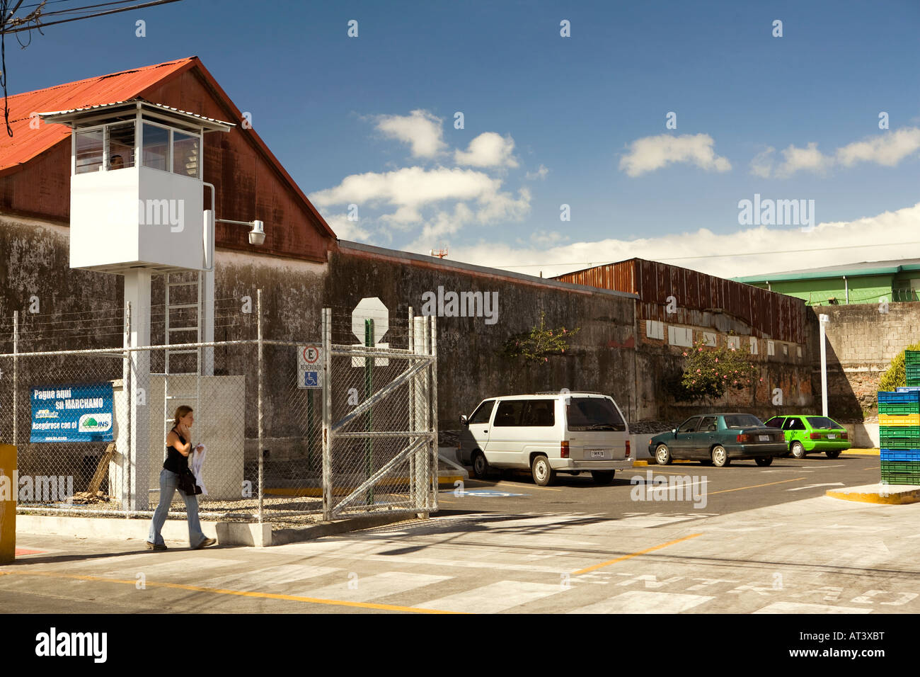 Costa Rica Cartago Avenida 2 cars parked in guarded public parking lot ...