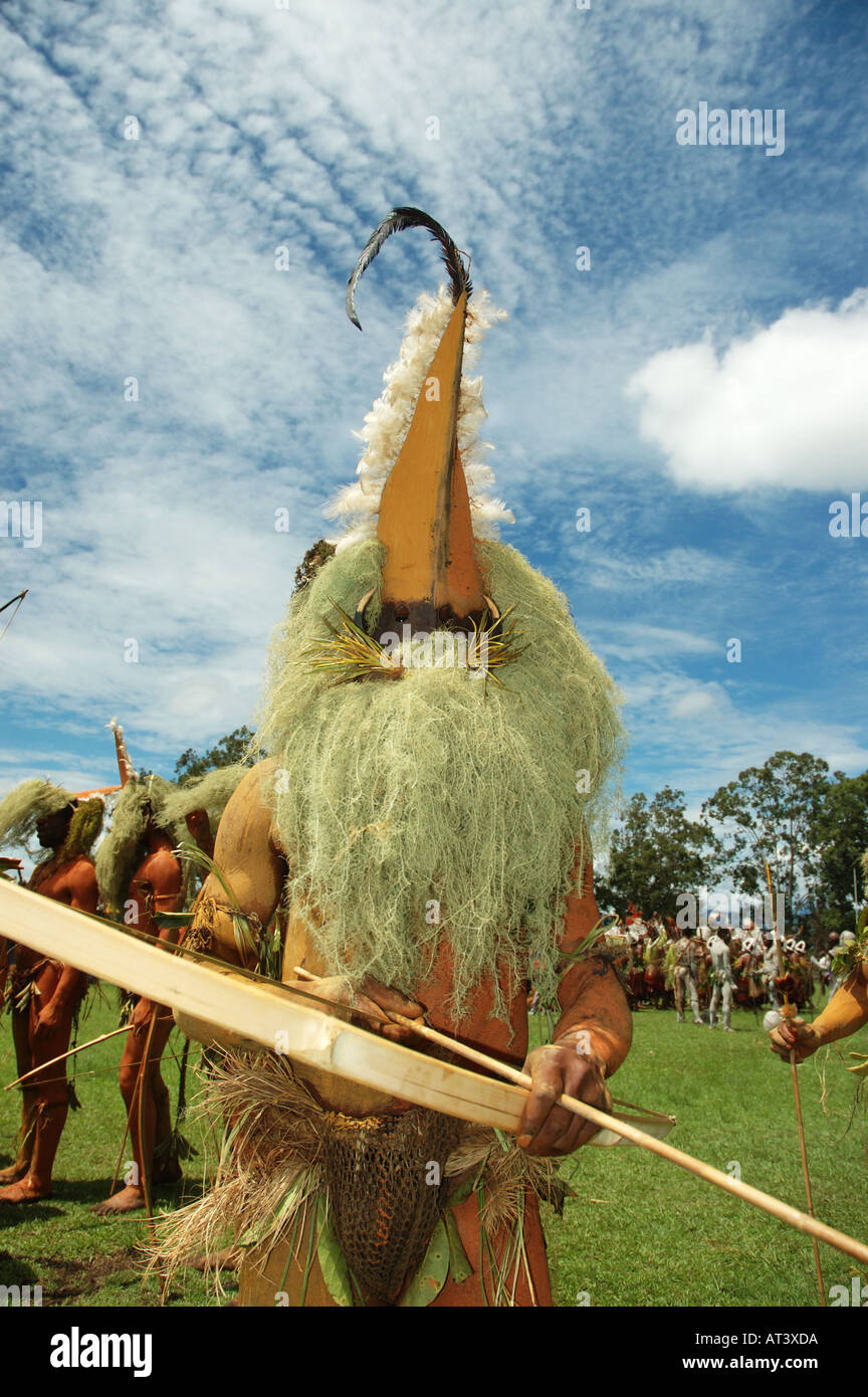 Moss man in palm frond mask with pig tusks Goroka show PNG Stock Photo ...