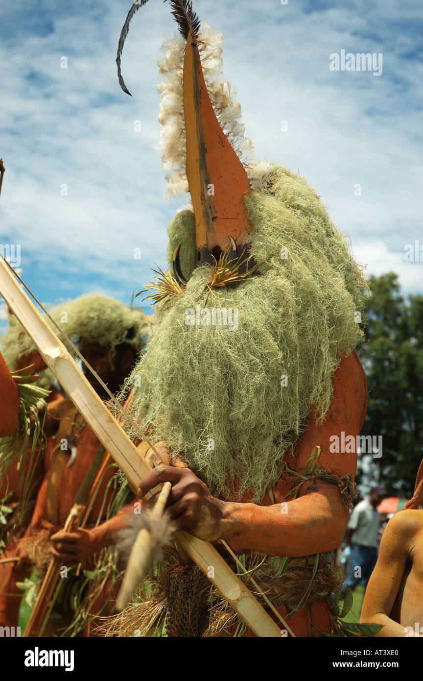 Moss man in palm frond mask with pig tusks Goroka show PNG Stock Photo ...