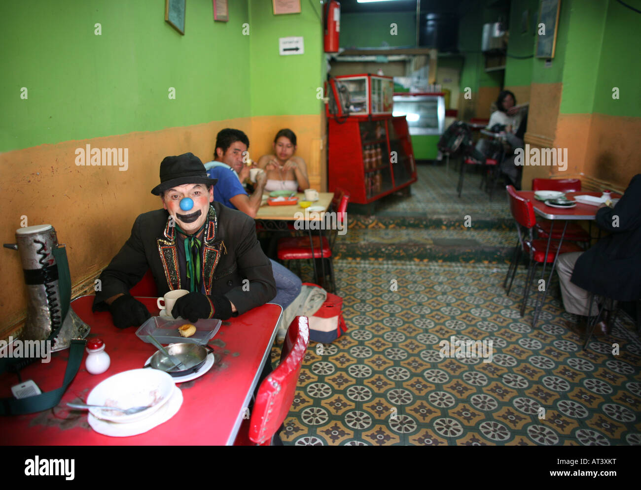 Clown having lunch in Bogota Stock Photo - Alamy
