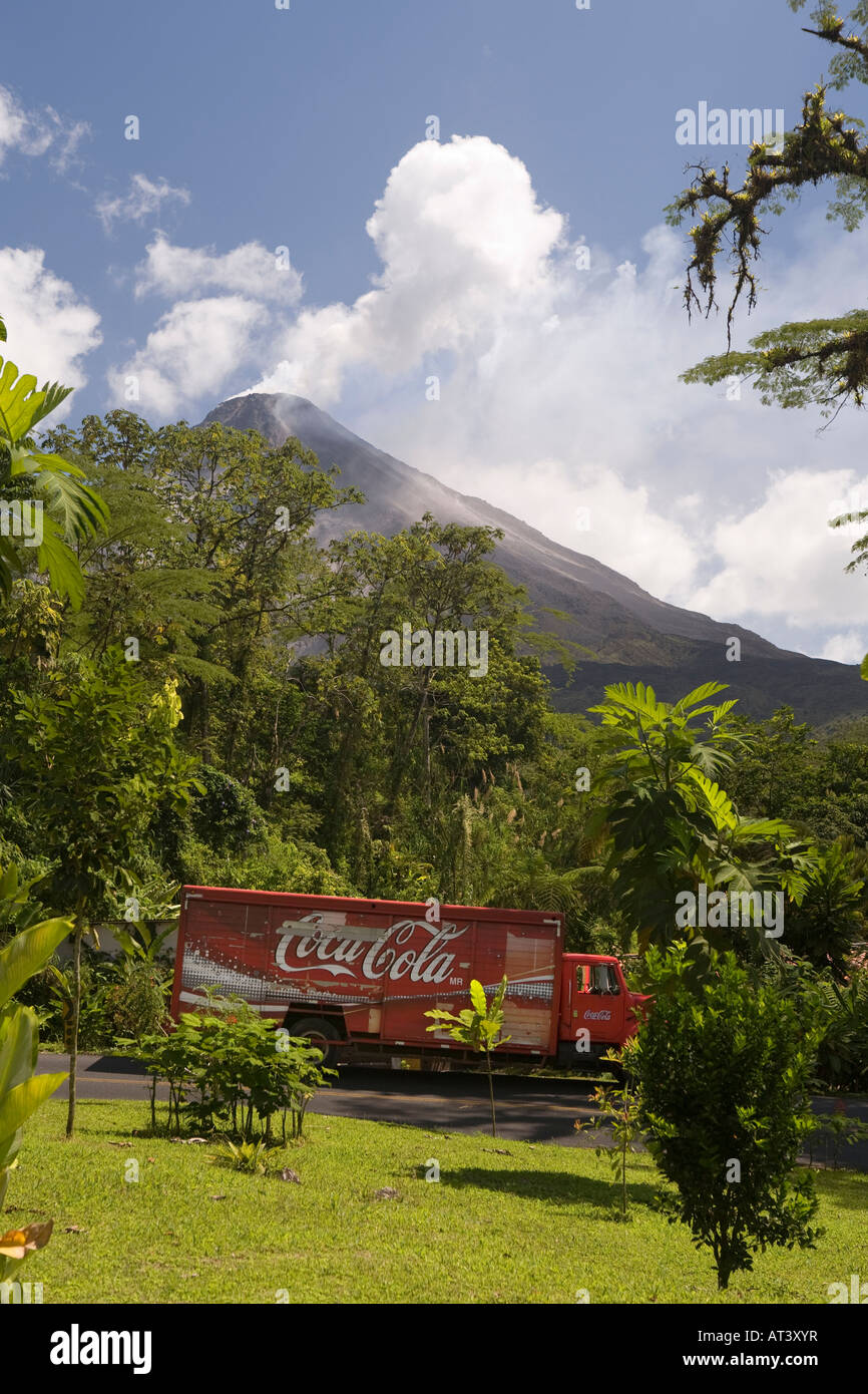 Costa Rica La Fortuna Coca Cola truck below Volcan Arenal Volcano Stock ...