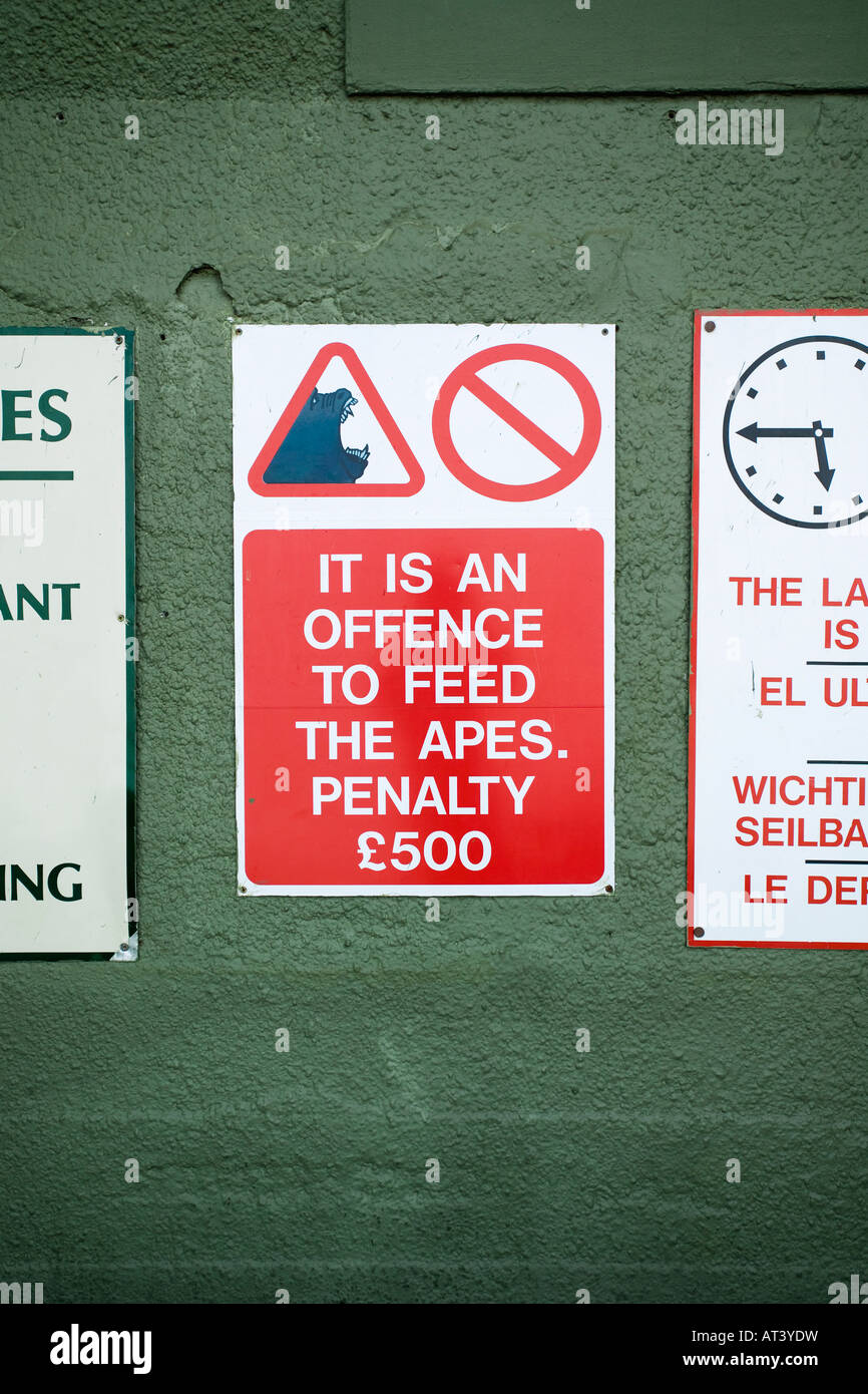 It is an offence to feed the apes sign at Gibraltar cable car station ...