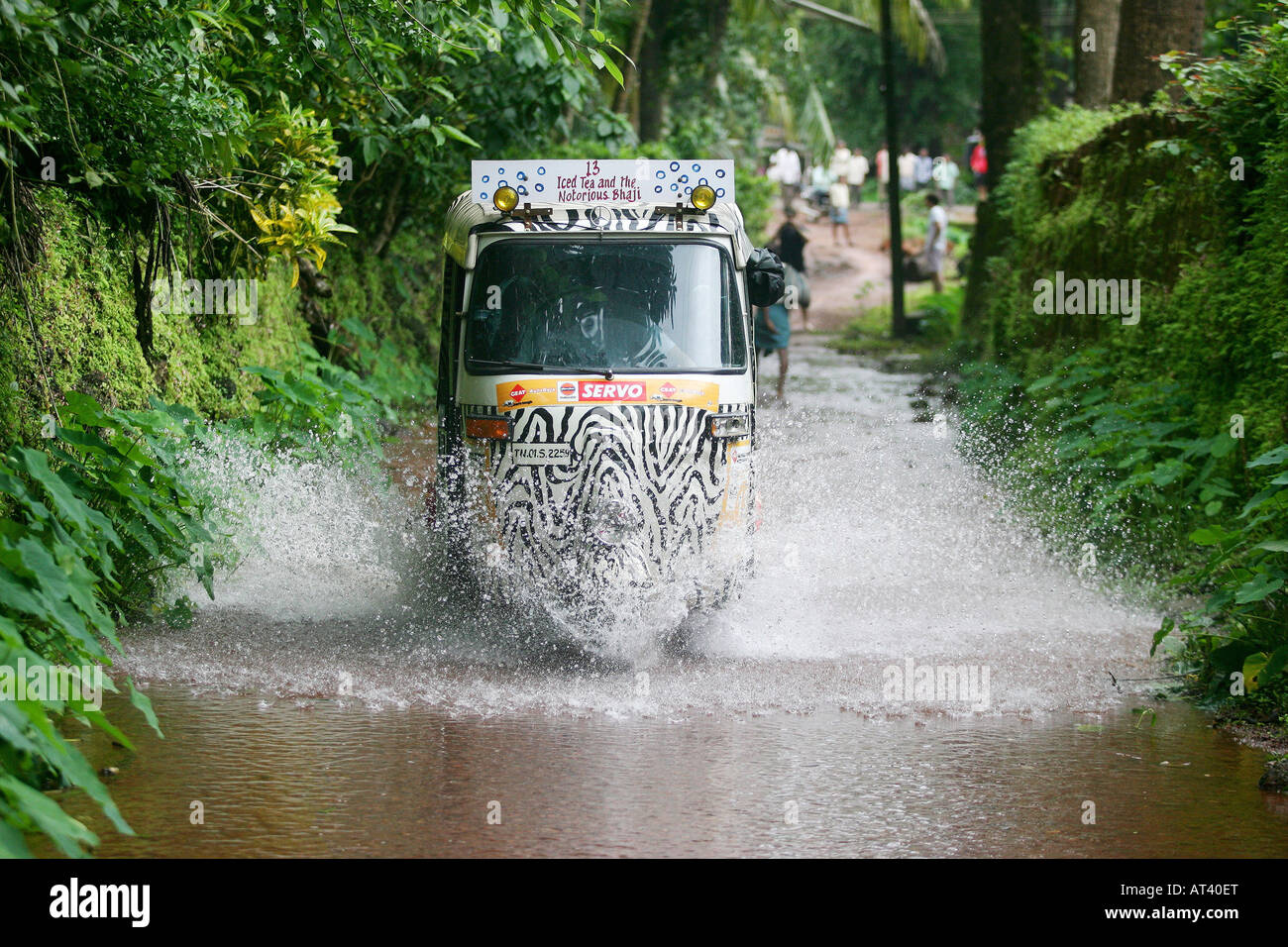 One of the team competing in the auto rickshaw rally across india Stock ...