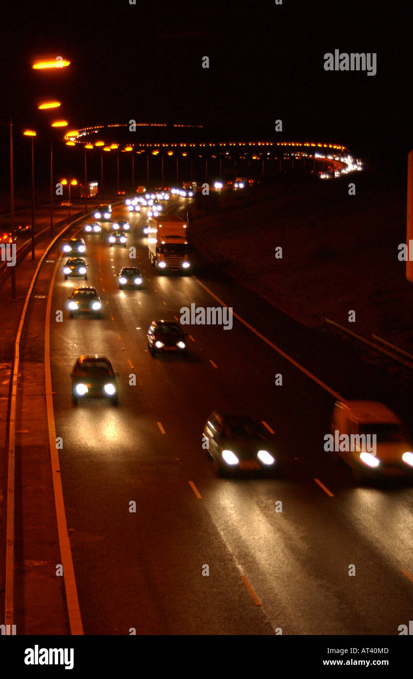Motorway at night with cars and street lights Stock Photo - Alamy