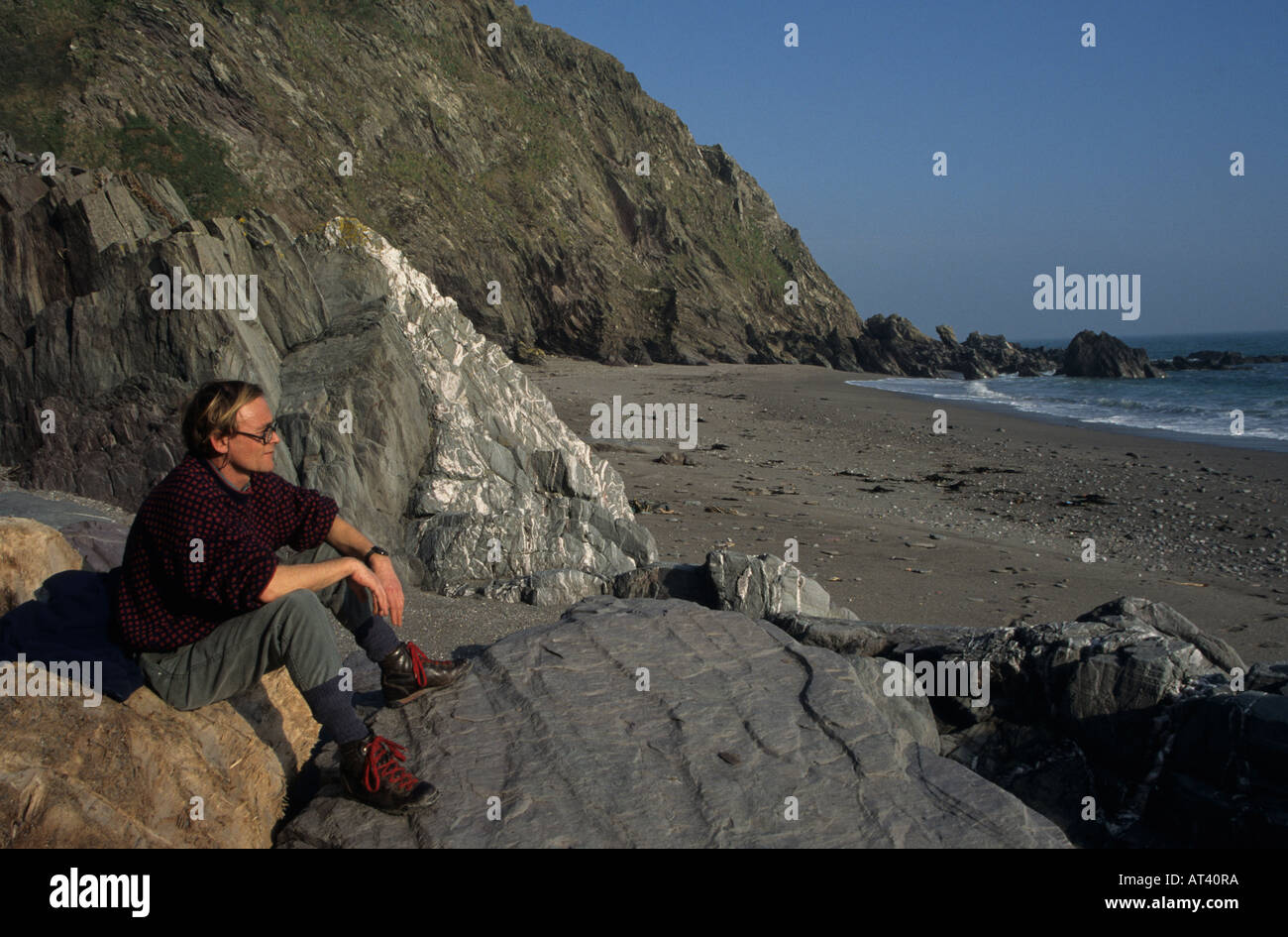 Walker on a cornish beach UK Cornwall Britain england Stock Photo - Alamy