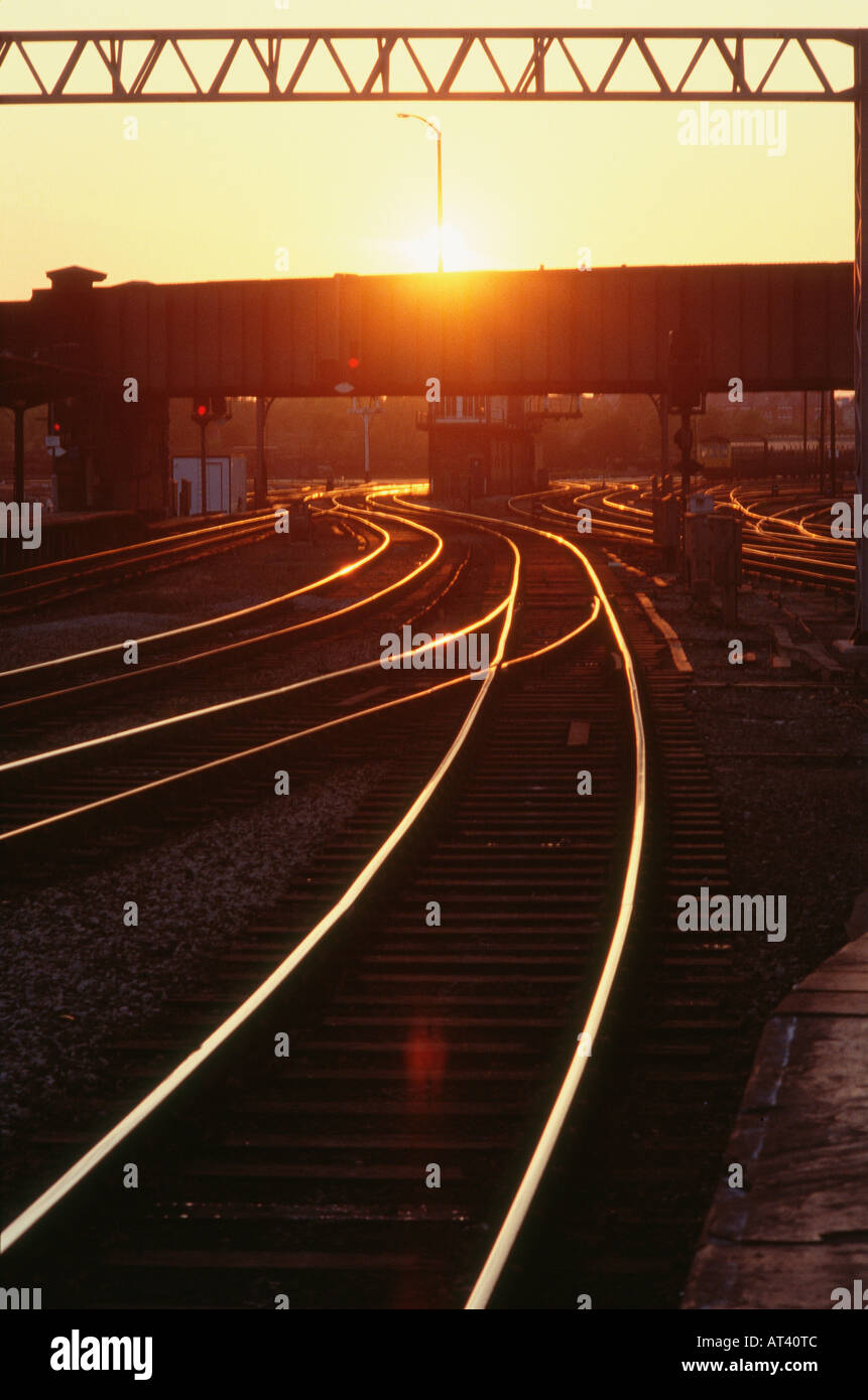 Railway lines with signal box at sunset Stock Photo - Alamy