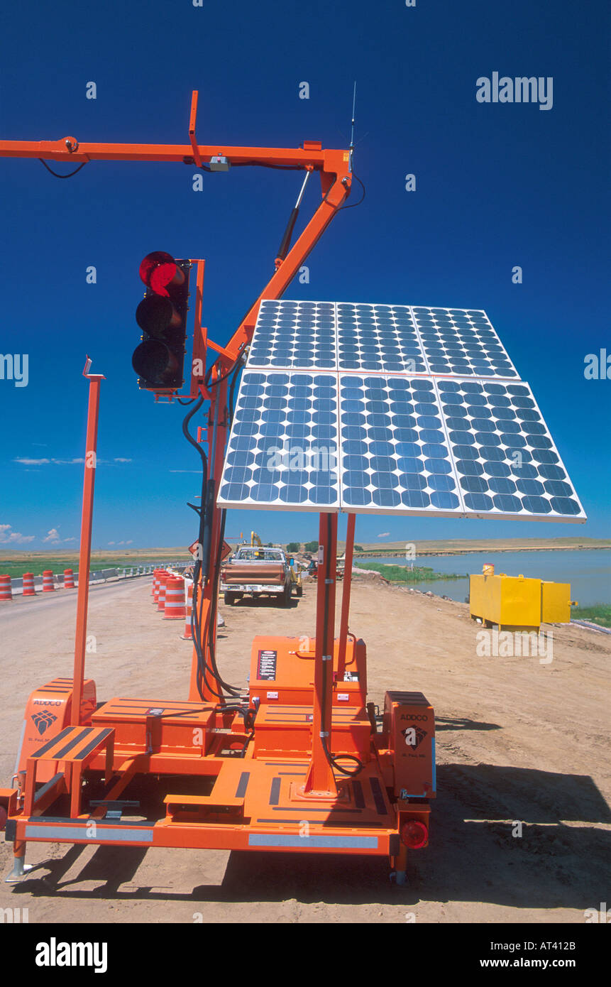 Solar powered portable traffic signal being used at a road construction ...