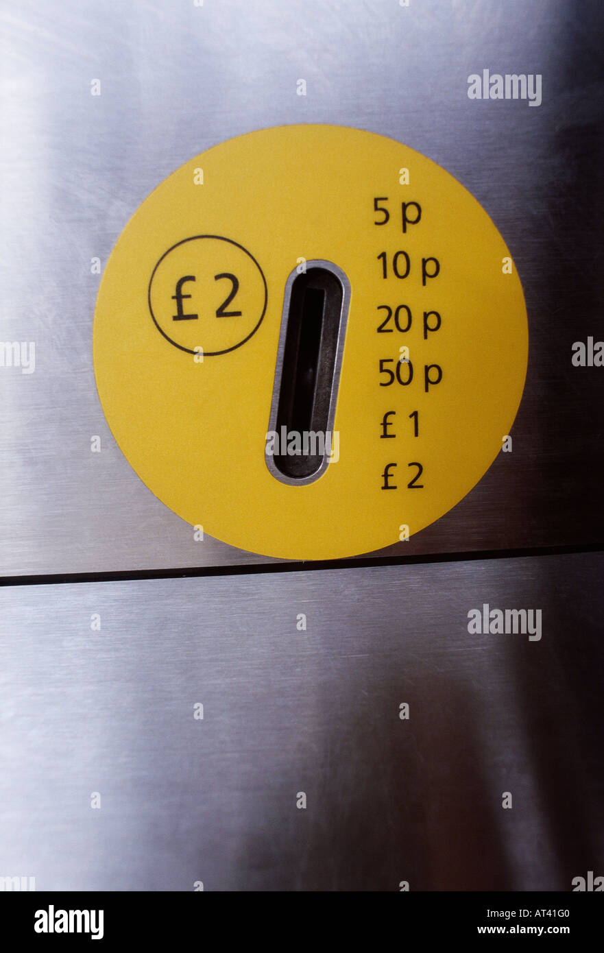 Coin slot for ticket machine Stock Photo - Alamy