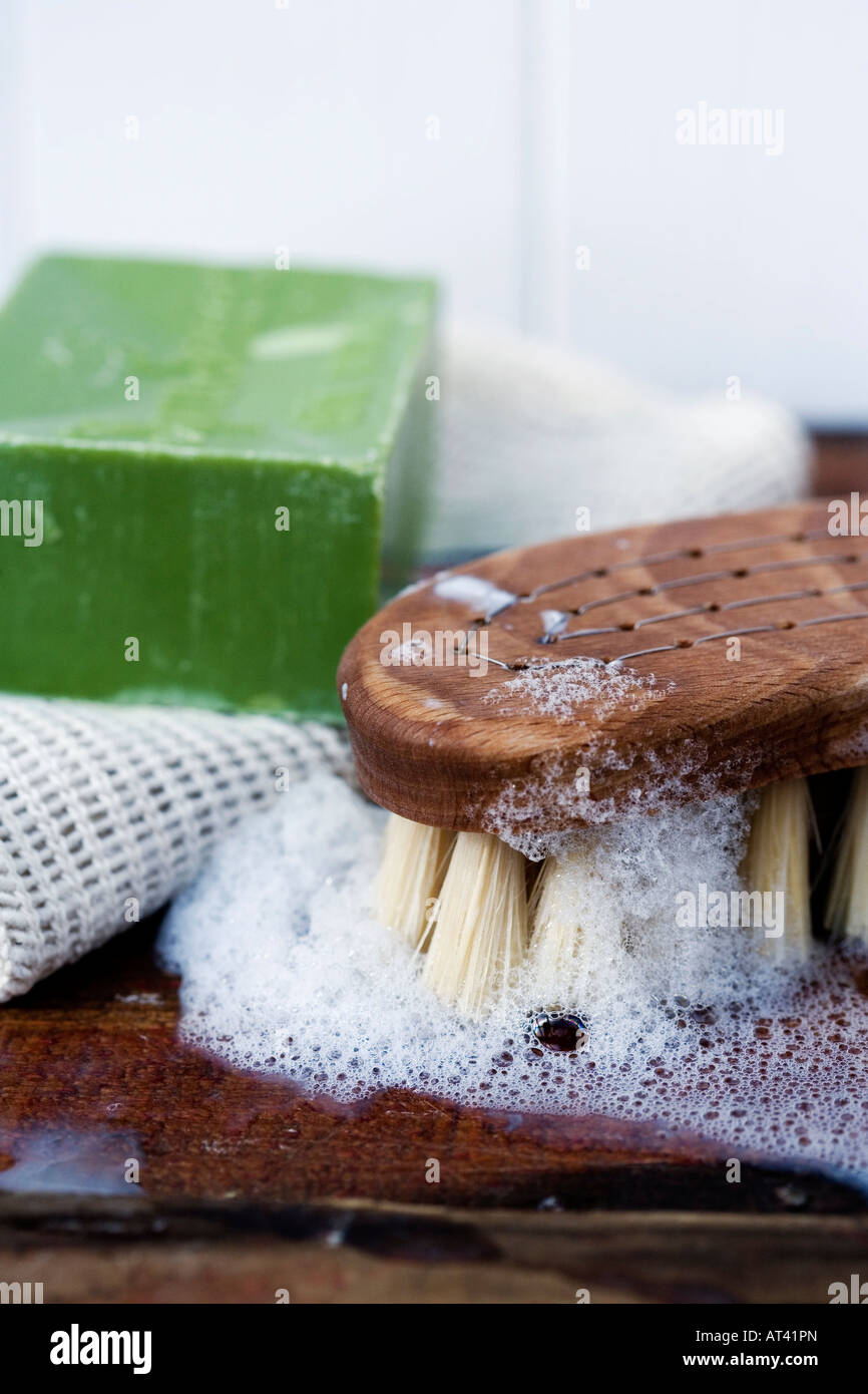Scrubbing brush with household soap and a traditional cloth Stock Photo ...