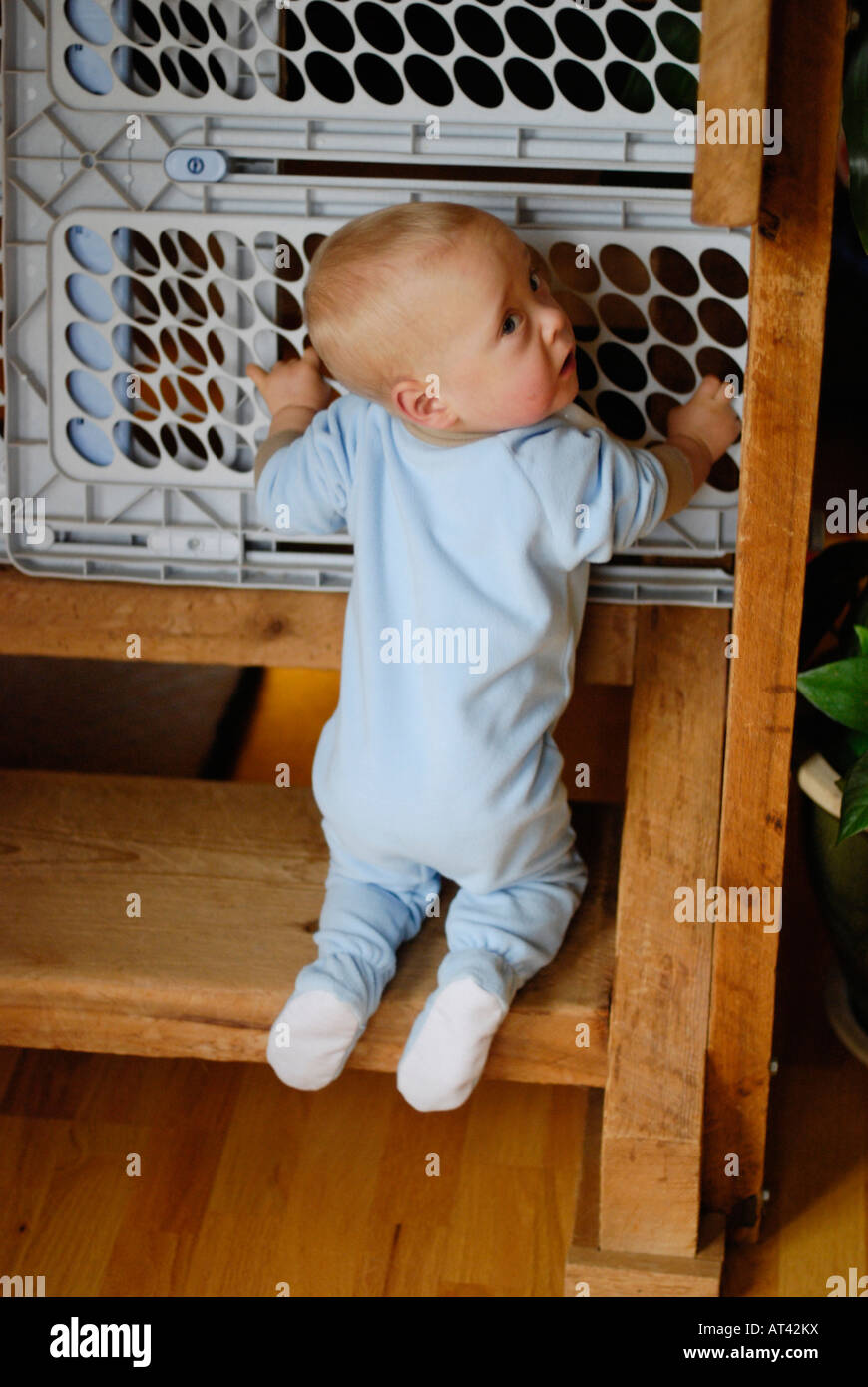 Toddler climbing steps hi-res stock photography and images - Alamy