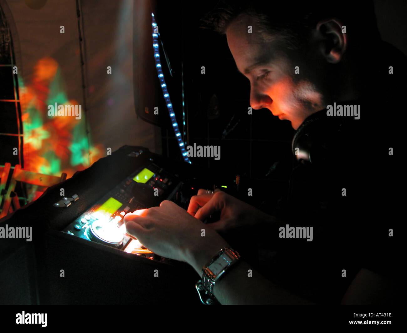mobile disco DJ at a sound mixing console Stock Photo - Alamy