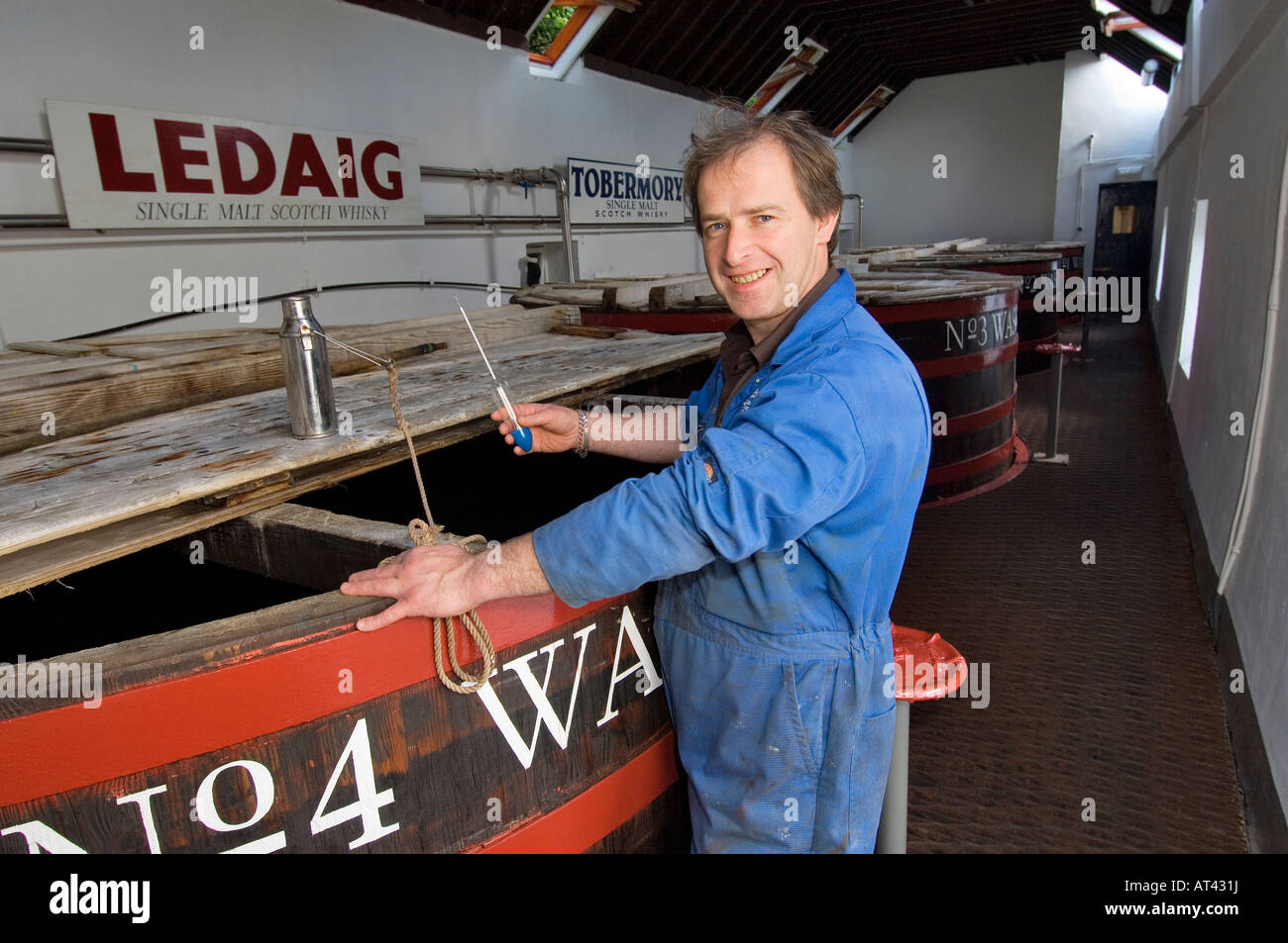 Tobermory Whisky Distillery, Isle of Mull. Mash man Colin Armour making ...