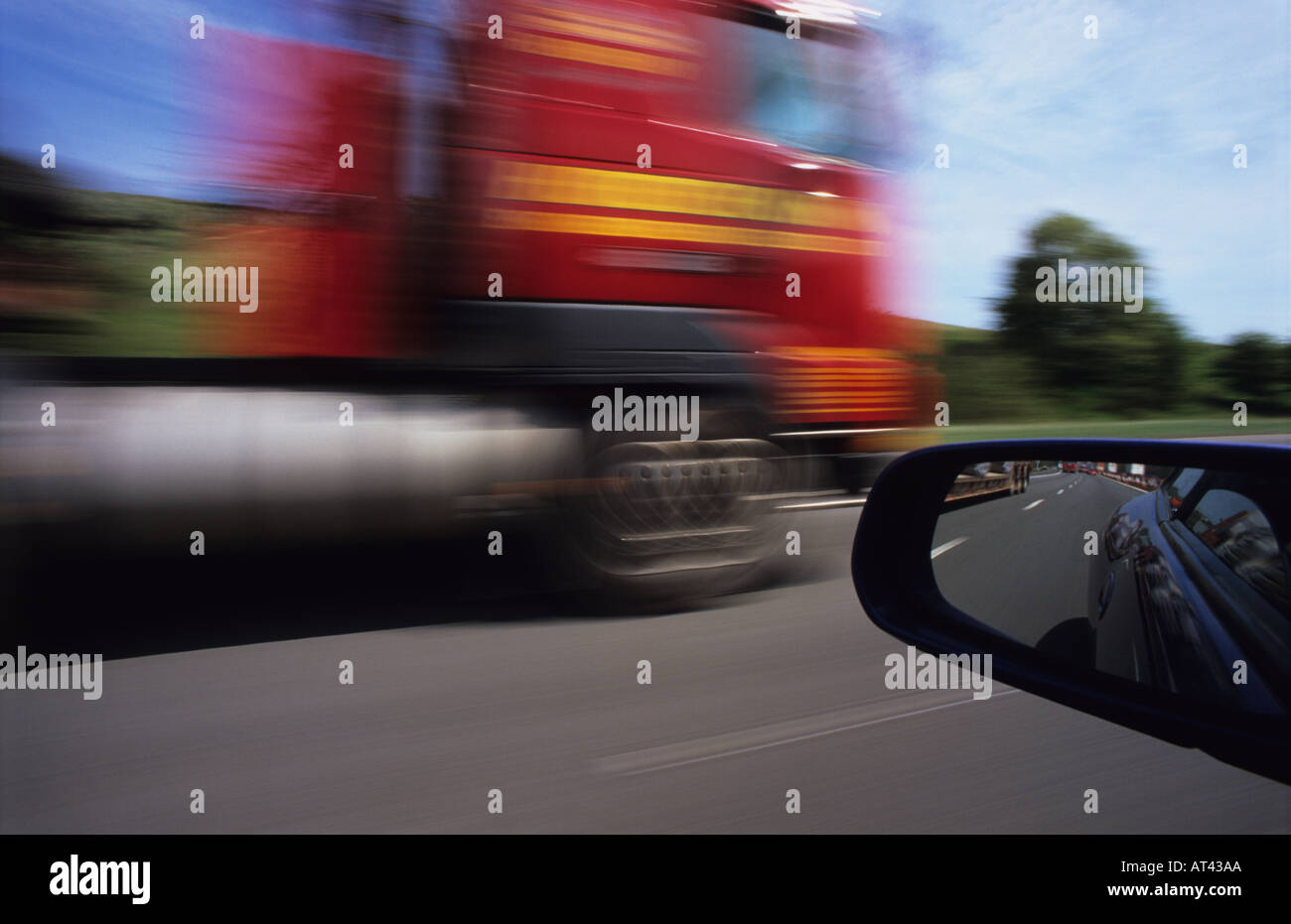 car overtaking lorry travelling on the a1/m1 motorway near leeds ...