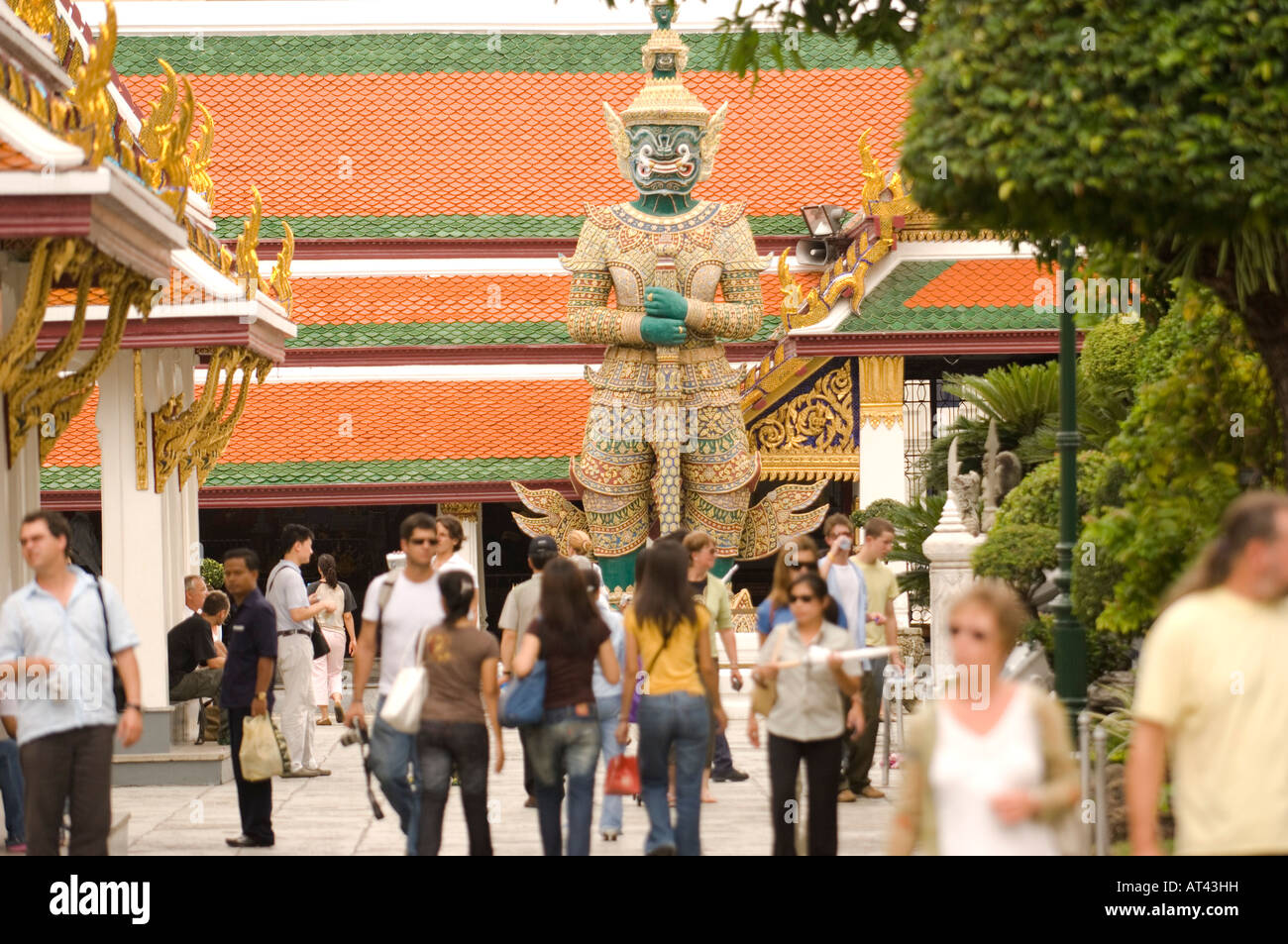 Large mythical beast statues guard the entrance to the Grand Palace ...