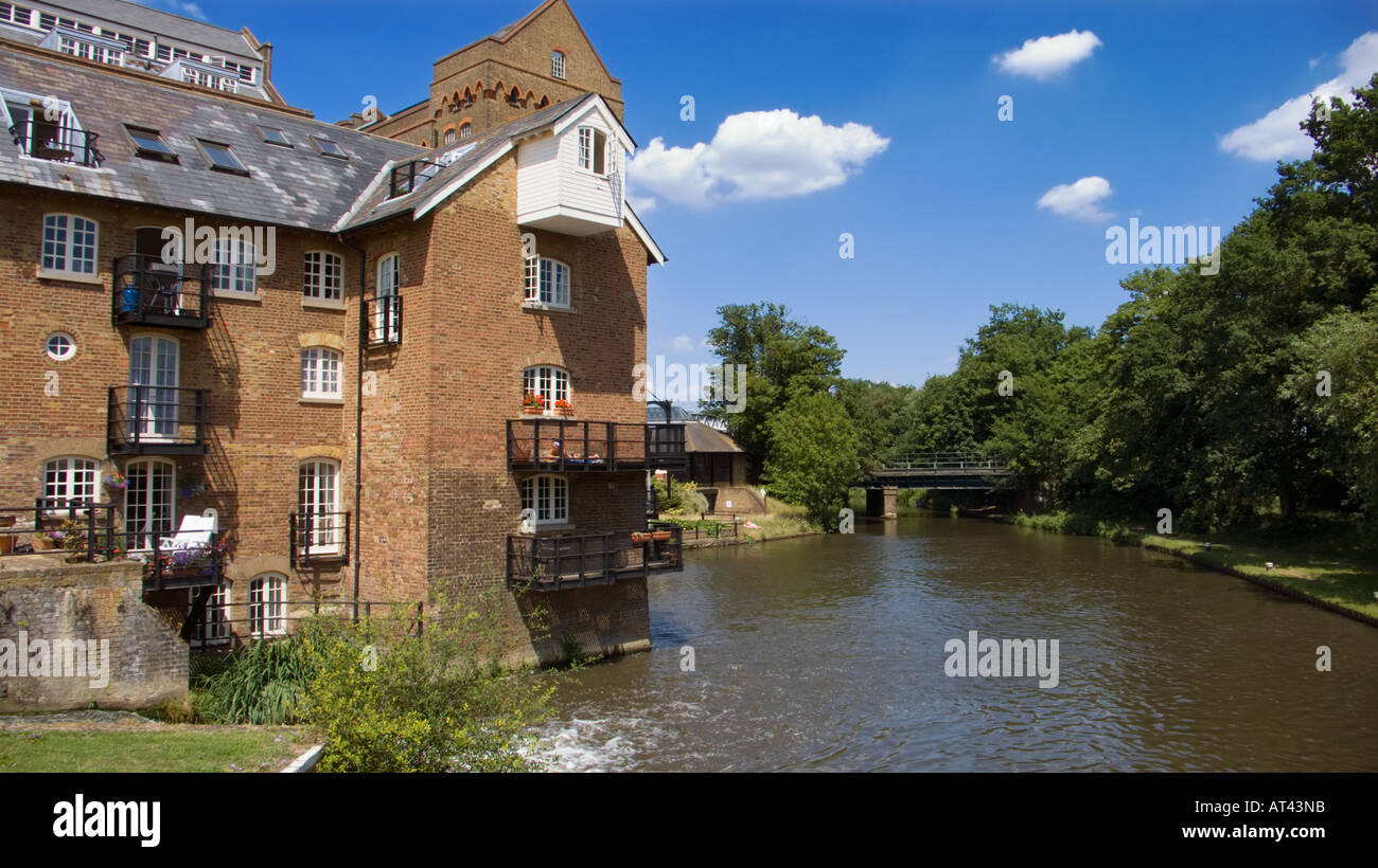 Old mill buildings at Coxs Lock on the River Wey Navigation canal ...